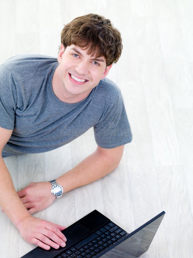 Portrait of Young Man with Smile Eith Laptop Stock Image - Image of ...