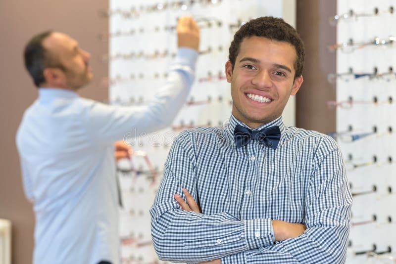 Portrait Young Man Wearing Bow-tie in Opticians Stock Photo - Image of ...