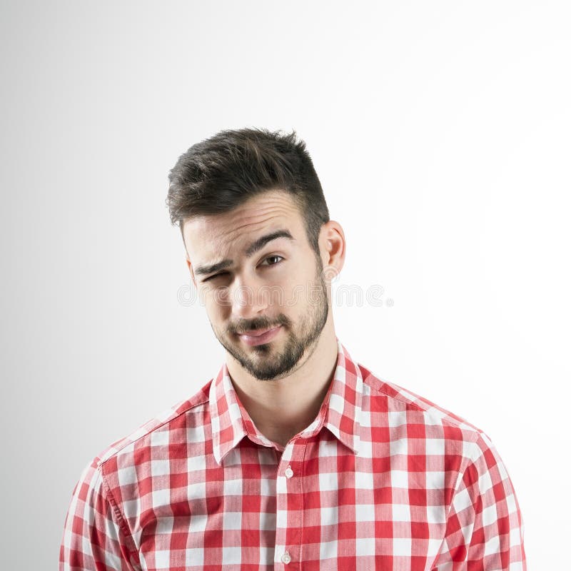5,845 Cheerful Young Man Winking Stock Photos - Free & Royalty-Free ...
