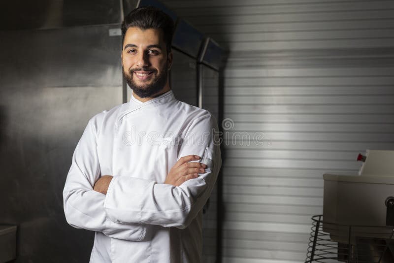 Young Pastry Chef Looking at Camera Smiling Stock Photo - Image of ...
