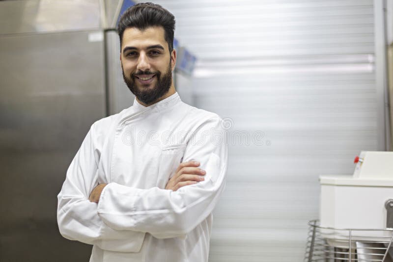 Young Pastry Chef Looking at Camera Smiling Stock Image - Image of ...