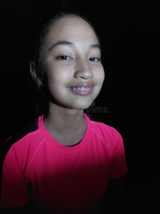 Portrait of a Young Person Isolated on Black Stock Photo - Image of ...