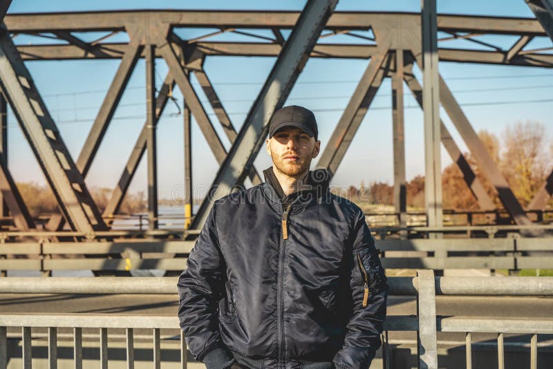 Portrait of Young Rapper Posing in Front of a White Wall Stock Photo ...
