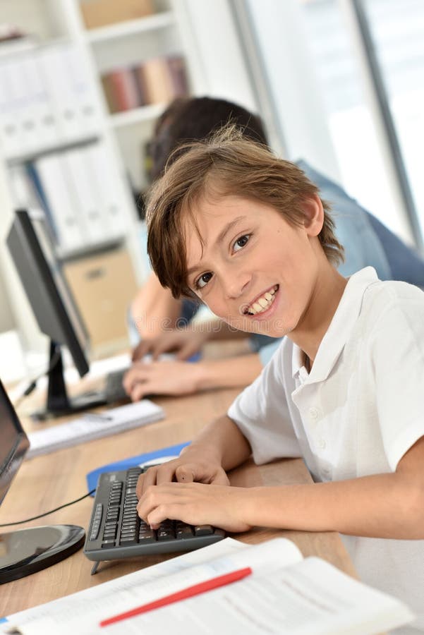 Portrait of Young School Boy in Classroom Stock Photo - Image of school ...