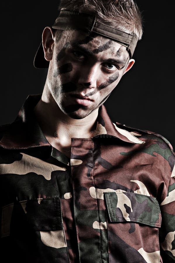 Serious Soldier Putting Out Arm Stock Photo - Image of conflict, offer ...
