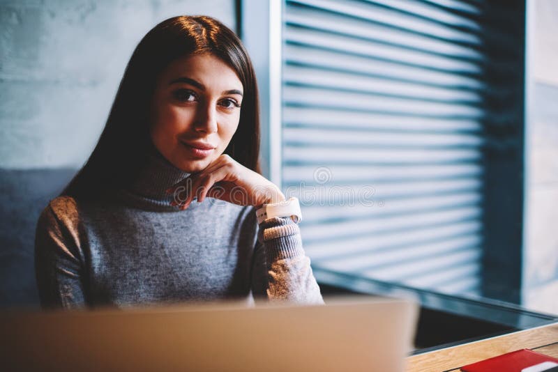 Young Brunette Woman Using Technology in Coffee Shop Interior Stock ...