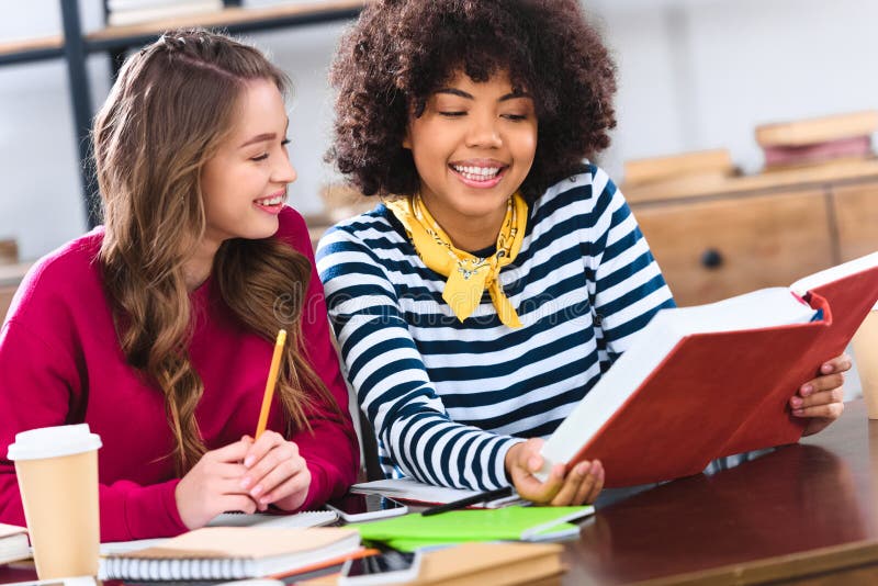 Portrait of Young Smiling Multicultural Students Doing Stock Photo ...
