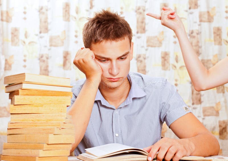 Young Frustrated Male Student between Study Books Stock Photo - Image ...