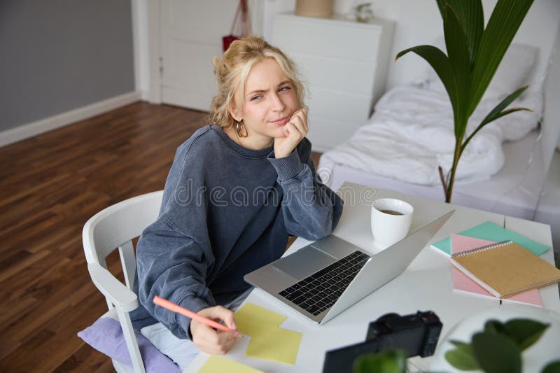 Portrait of Young Thoughtful Girl, Studying, Making Notes, Writing Down ...