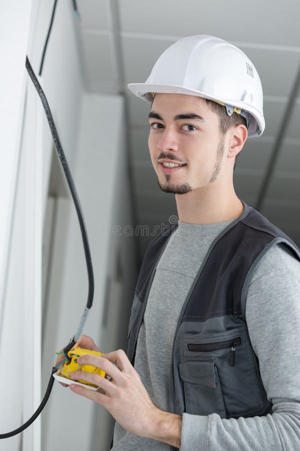 Portrait of Young Tradesman Stock Image - Image of contractor, switch ...
