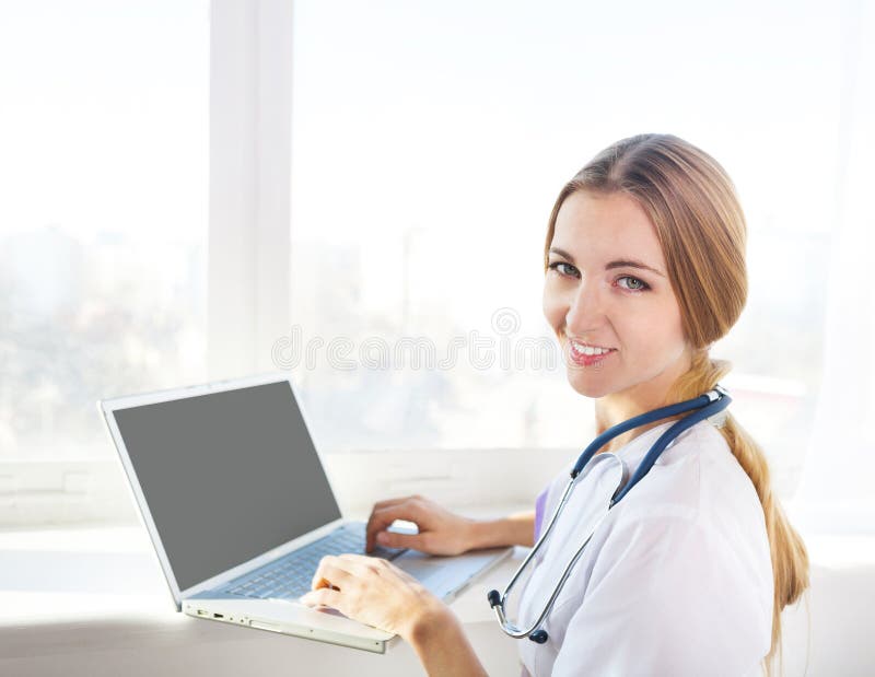 Portrait of Young Woman Doctor at Computer Stock Image - Image of ...