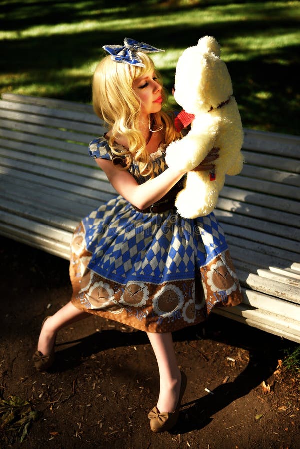 Portrait Young Woman Dressed As Doll Sitting Bench Stock Photos - Free ...