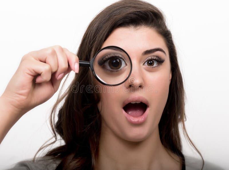Portrait of Young Woman Looking through Magnifying Glass Stock Image ...