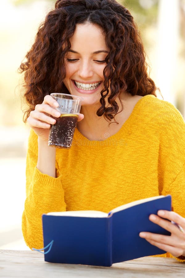 Young Woman Reading Book with a Drink Stock Photo - Image of happy ...