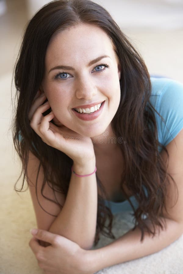 Portrait of Young Woman Relaxing Stock Image - Image of indoors, pretty ... Portrait of Young Woman Relaxing Stock Image - Image of indoors, pretty ...