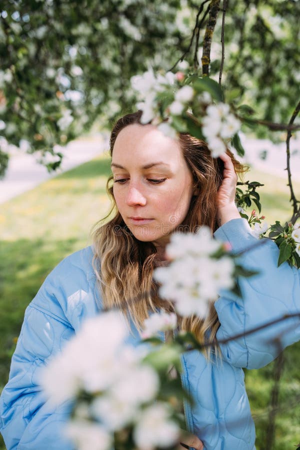 Portrait of a Young Woman in Spring in a Park Stock Photo - Image of ...
