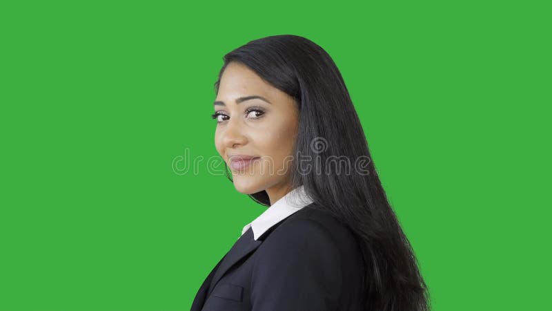 Portrait Of Young Woman In Suit Isolated On Green Screen Background