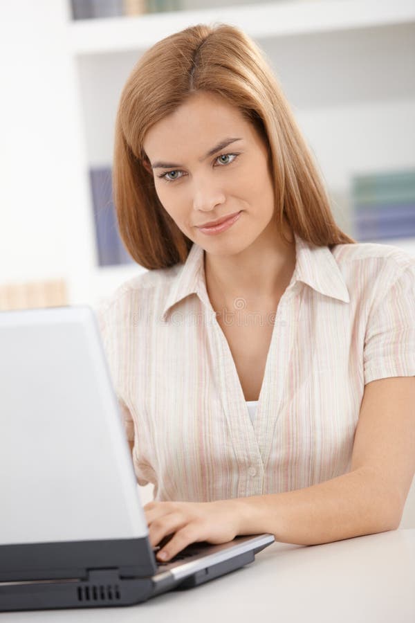 Portrait of Young Woman Using Laptop Smiling Stock Photo - Image of ...