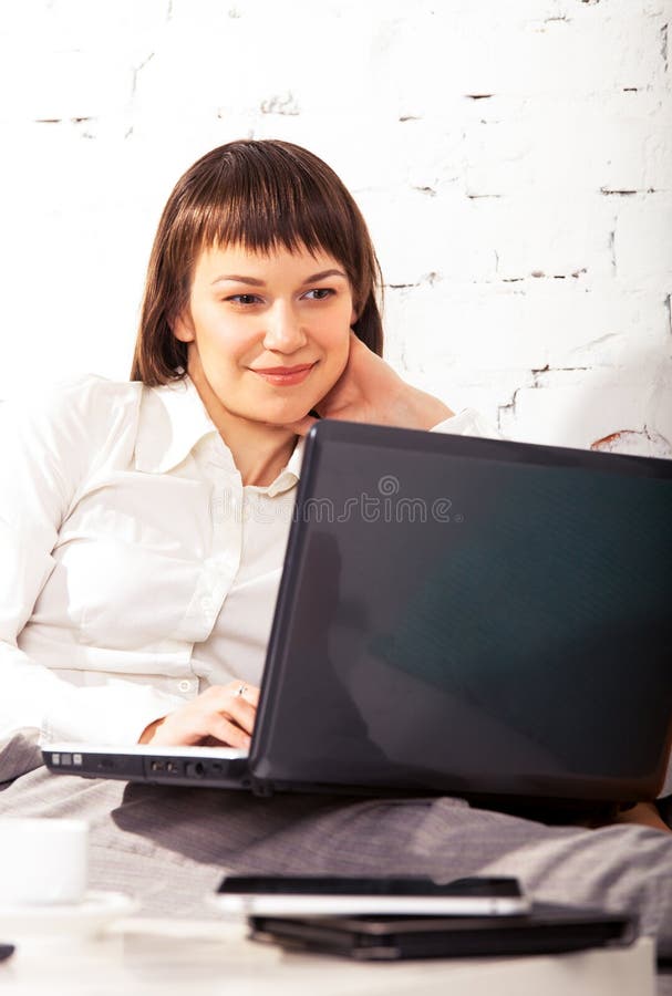 Portrait of a Young Woman Working on Laptop Stock Photo - Image of ...