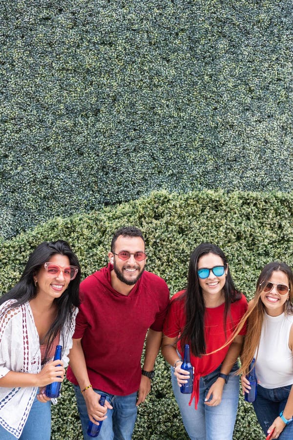 Portraits of Latino Friends Having Fun in the Outdoors Stock Photo ...