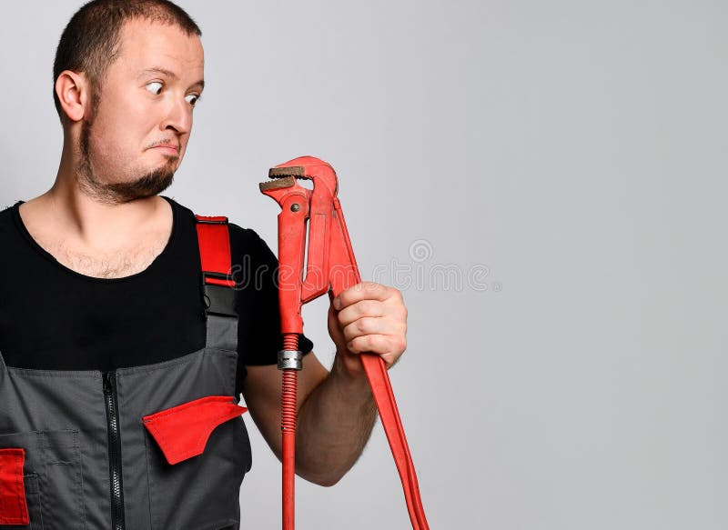 Portraits of a plumber stock photo. Image of master - 159930736