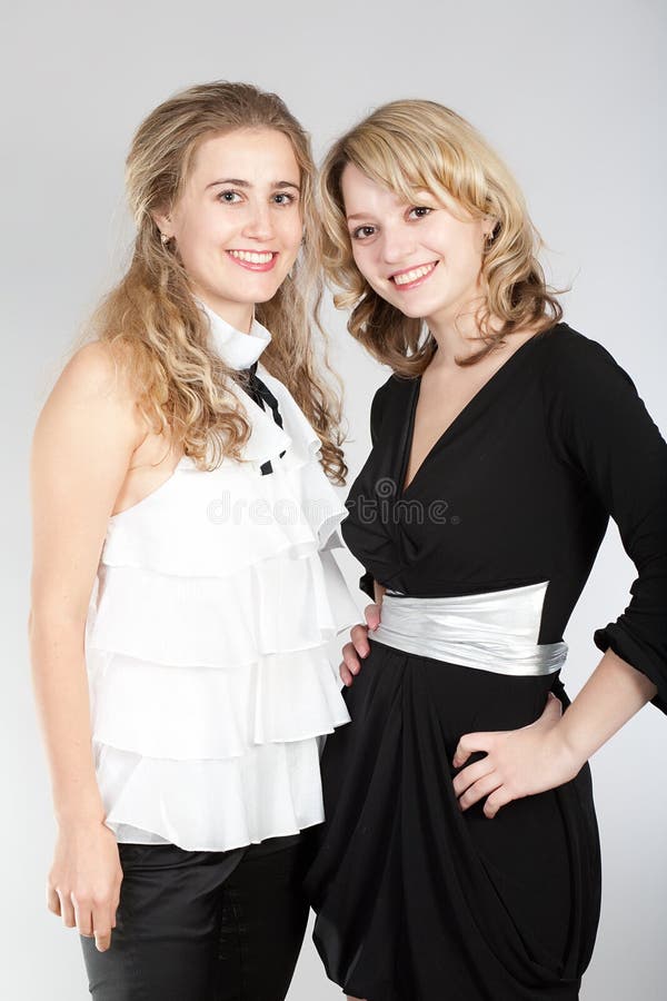 Portraits of Two Beautiful Girls Stock Image - Image of black, adult ...