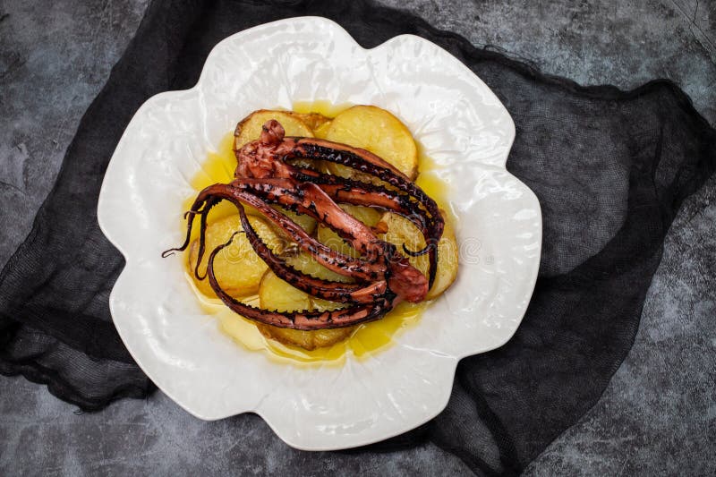 Portuguese Dish Octopus with Potato on White Plate Stock Image - Image ...