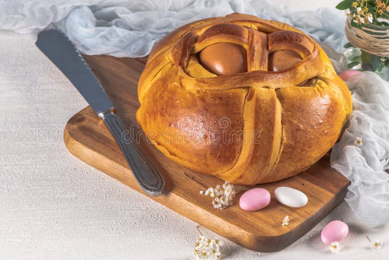 Portuguese Traditional Easter Cake. Folar with Eggs on Wooden Table ...