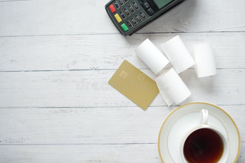 POS Machine and Long Roll Paper on Blue . Stock Image - Image of retail ...