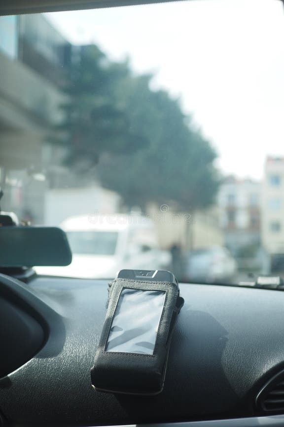 A Pos Machine Rests on a Car Dashboard, Stock Image - Image of mobile ...
