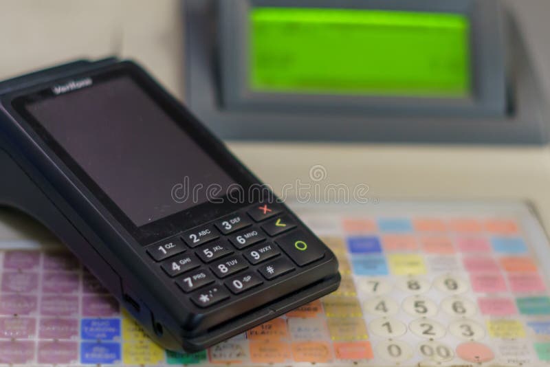 POS Terminal and Cash Register. Payment Commerce through Mobile and ...