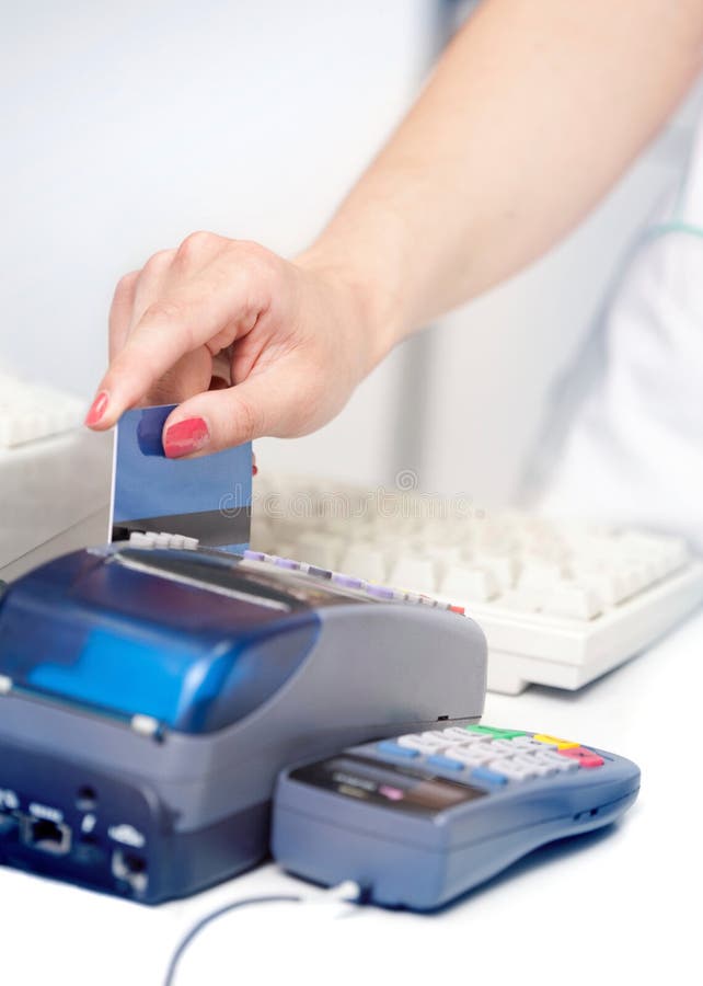 POS Terminal Transaction. Hand Swiping a Credit Card. Stock Image ... POS Terminal Transaction. Hand Swiping a Credit Card. Stock Image ...