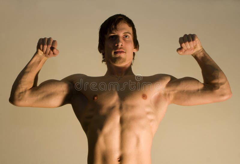 Pose of bodybuilder stock image. Image of light, power - 8018143