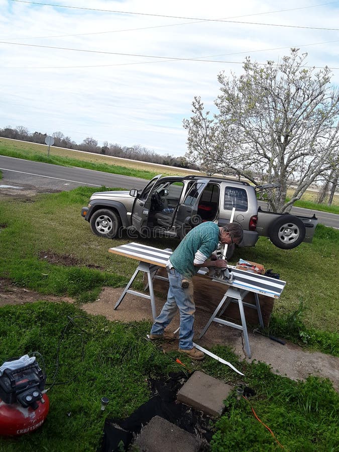 Pose of Working Man during Construction Building and Fixing Home Door ...