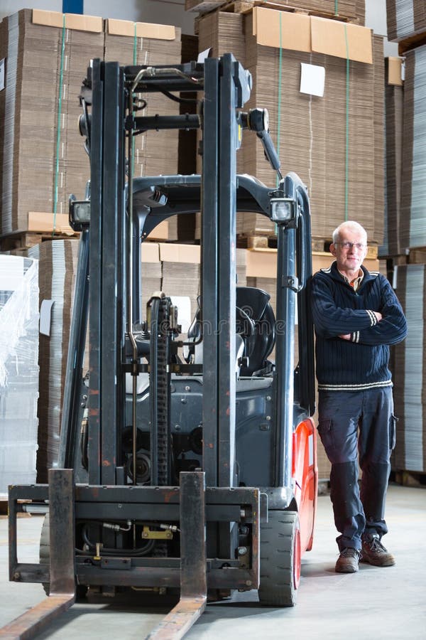 Posing Alongside a Forklift Stock Image - Image of center, distribution ...
