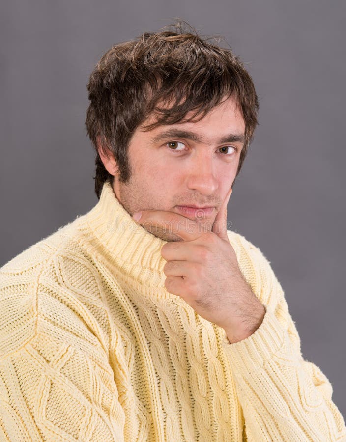 Handsome Man in Sweater Pointing His Finger Up Stock Photo - Image of ...