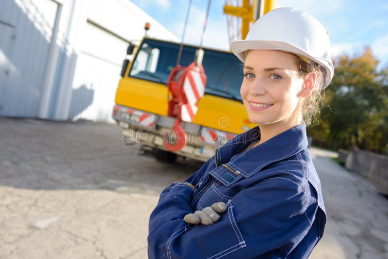 Posing with Heavy Equipment at Background Stock Photo - Image of ...