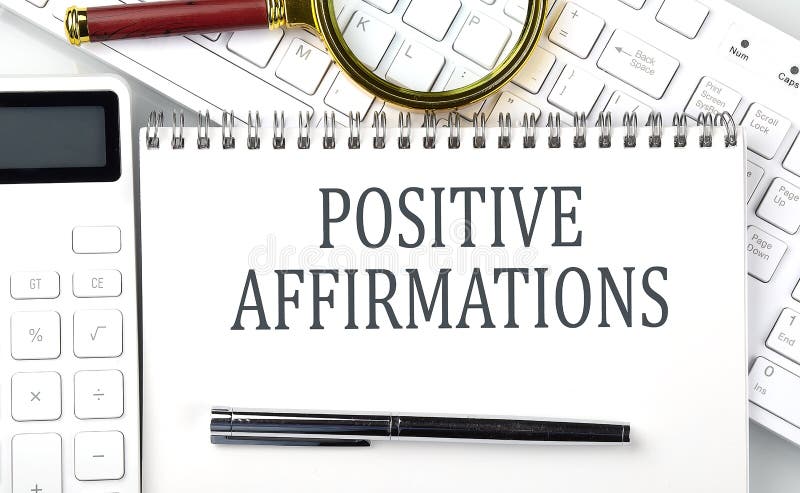 POSITIVE AFFIRMATIONS Text on Notepad with Calculator and Keyboard ...