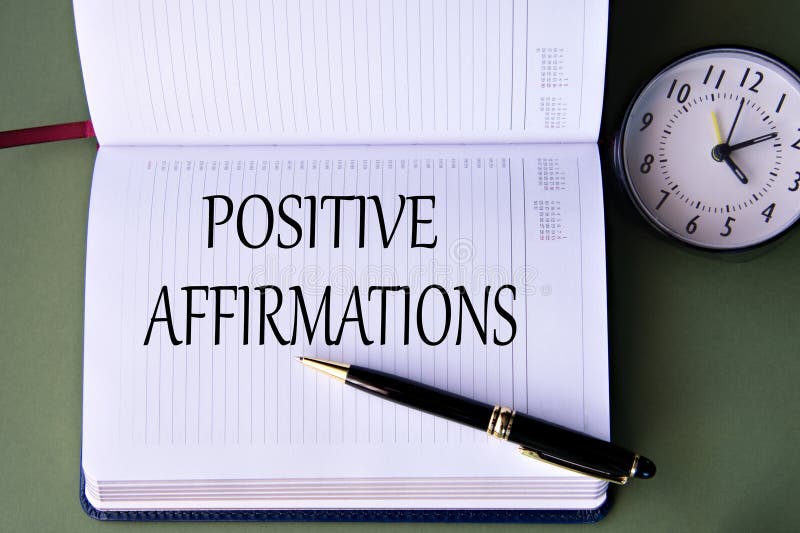 POSITIVE AFFIRMATIONS - Words in a White Notebook on a Dark Green ...