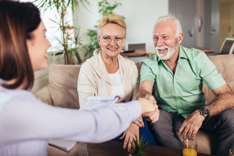 Aged Couple Consulting with Insurance Agent Stock Image - Image of ...