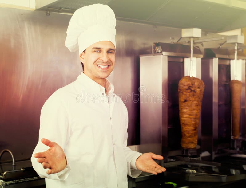Positive Arabian Cook Posing Near Meat for Kebab Stock Photo - Image of ...