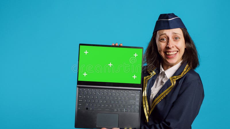 Positive Aviator Showing Laptop with Greenscreen Stock Photo - Image of ...