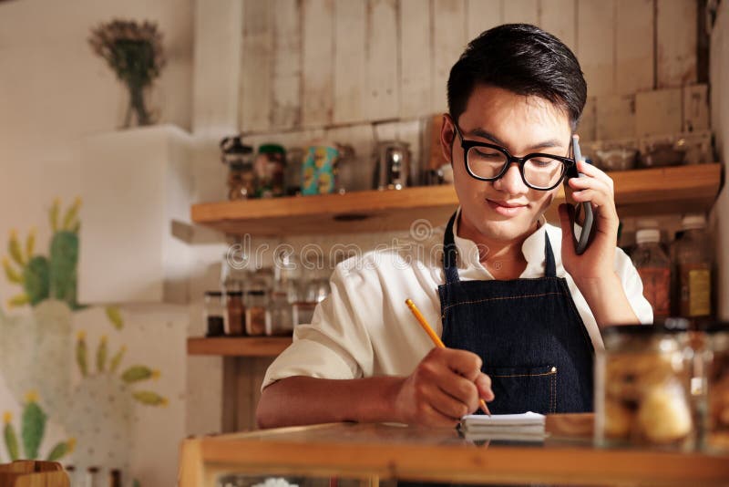 Barista Accepting Order stock image. Image of technology - 251833665