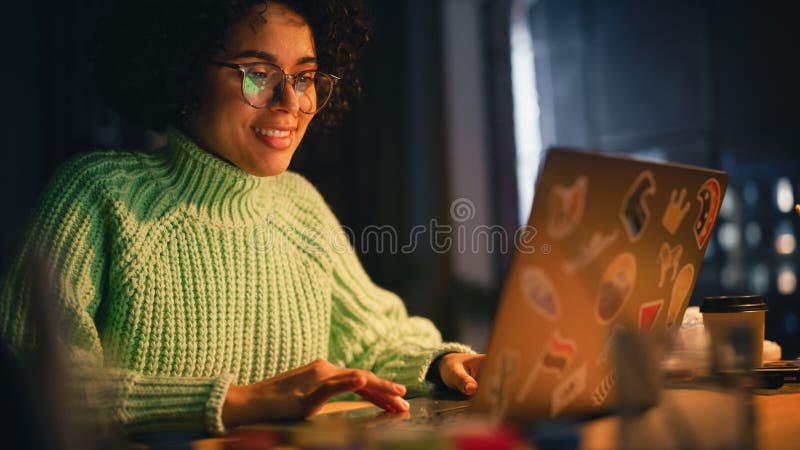 Positive Black Female Software Engineer Coding on Laptop Computer, Working with Inspiration in ...