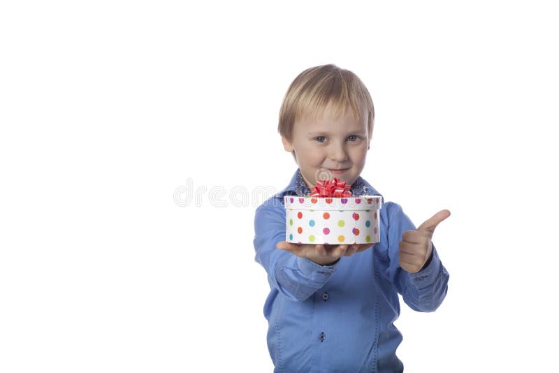 Positive boy holds present stock photo. Image of blue - 29779810