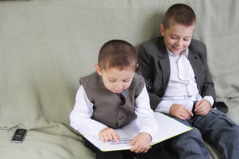 Positive Brothers Reading Book Stock Image - Image of boys, positive ...