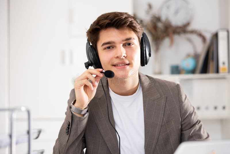 Positive Businessman with Headphones and Microphone Having Video Call ... Positive Businessman with Headphones and Microphone Having Video Call ...