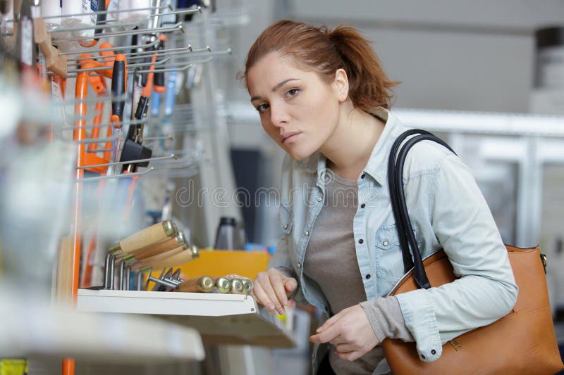 Positive Cheerful Female Looking for Tools Stock Image - Image of ...