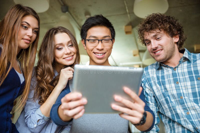 Positive Cheerful Happy Friends Using Tablet Stock Image - Image of ...