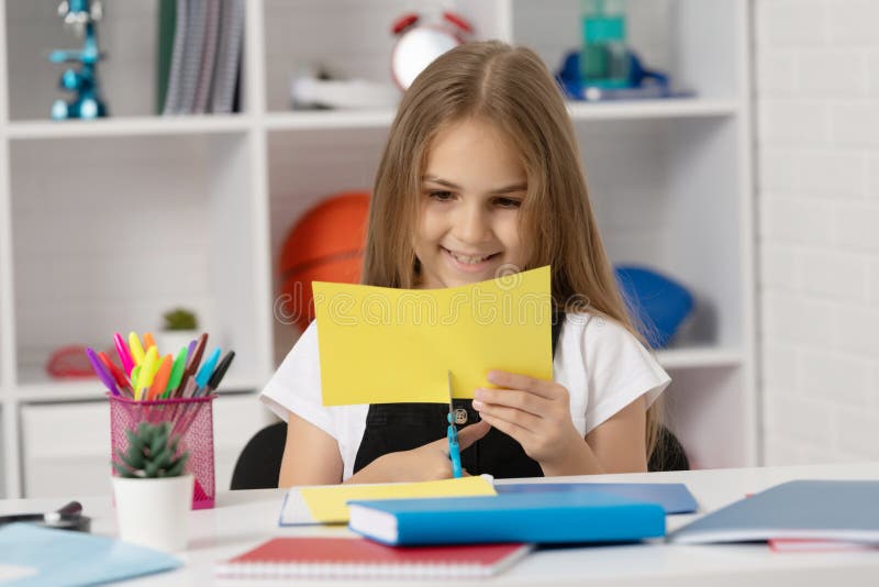 Positive Child Cut Paper in School Classroom Stock Image - Image of ...